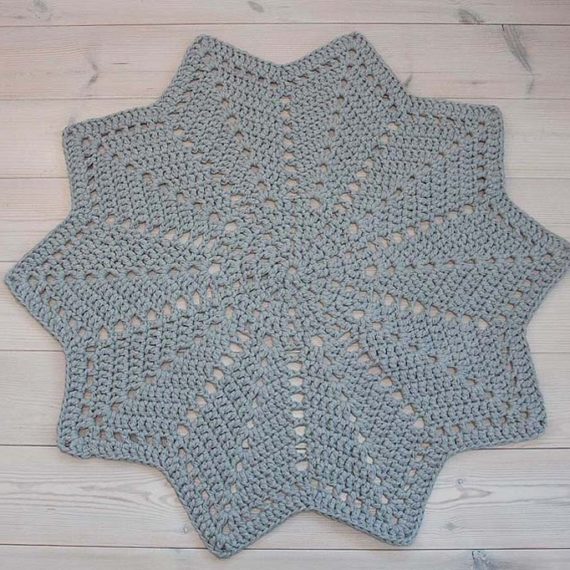 Grey star shaped crochet doily rug